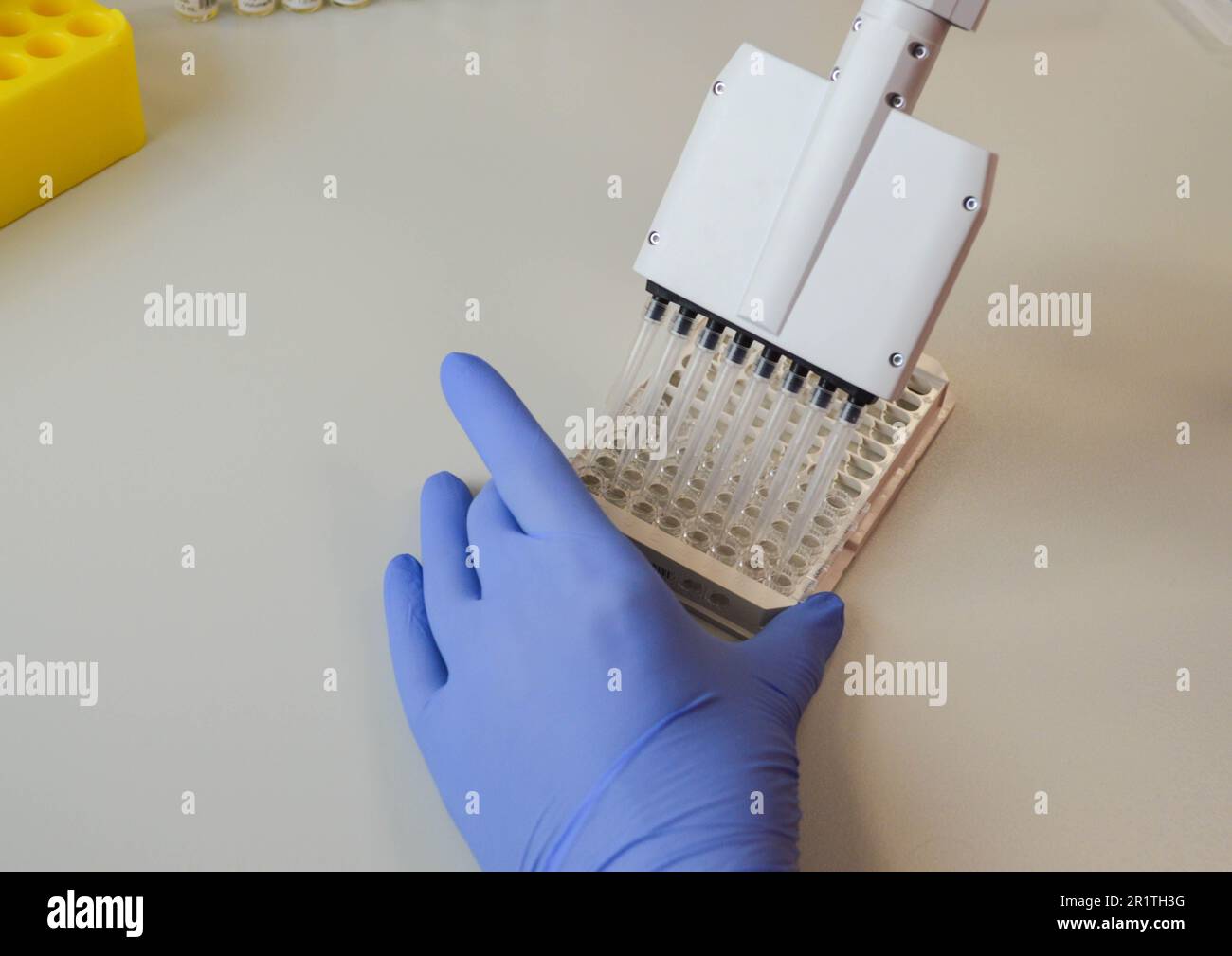 Single-channel dispenser with variable volume.Medical worker, scientist ...