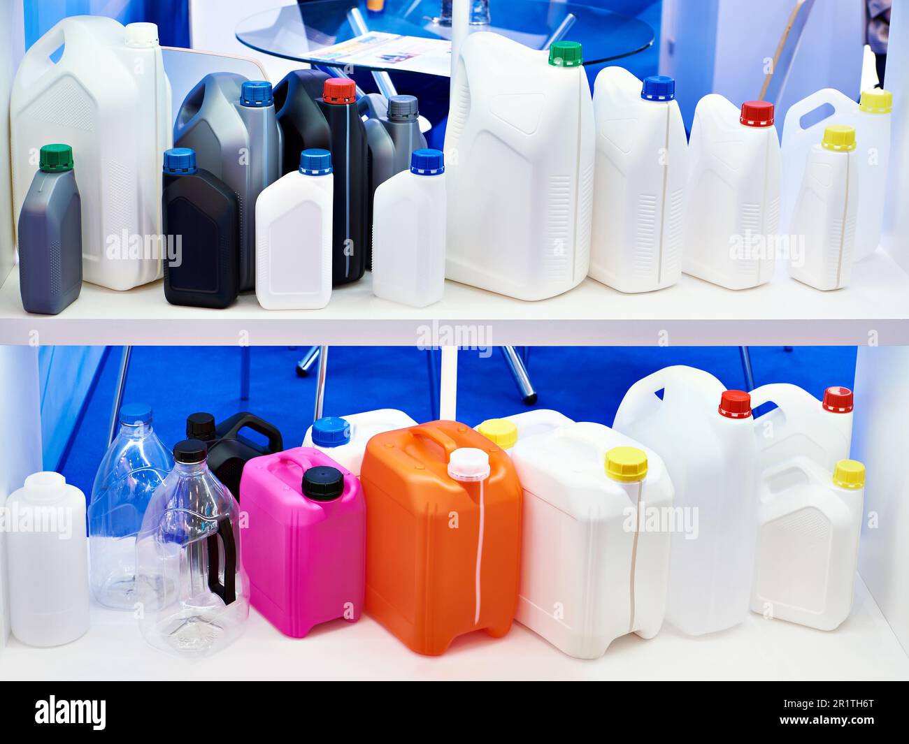 Plastic canisters at the store exhibition Stock Photo - Alamy