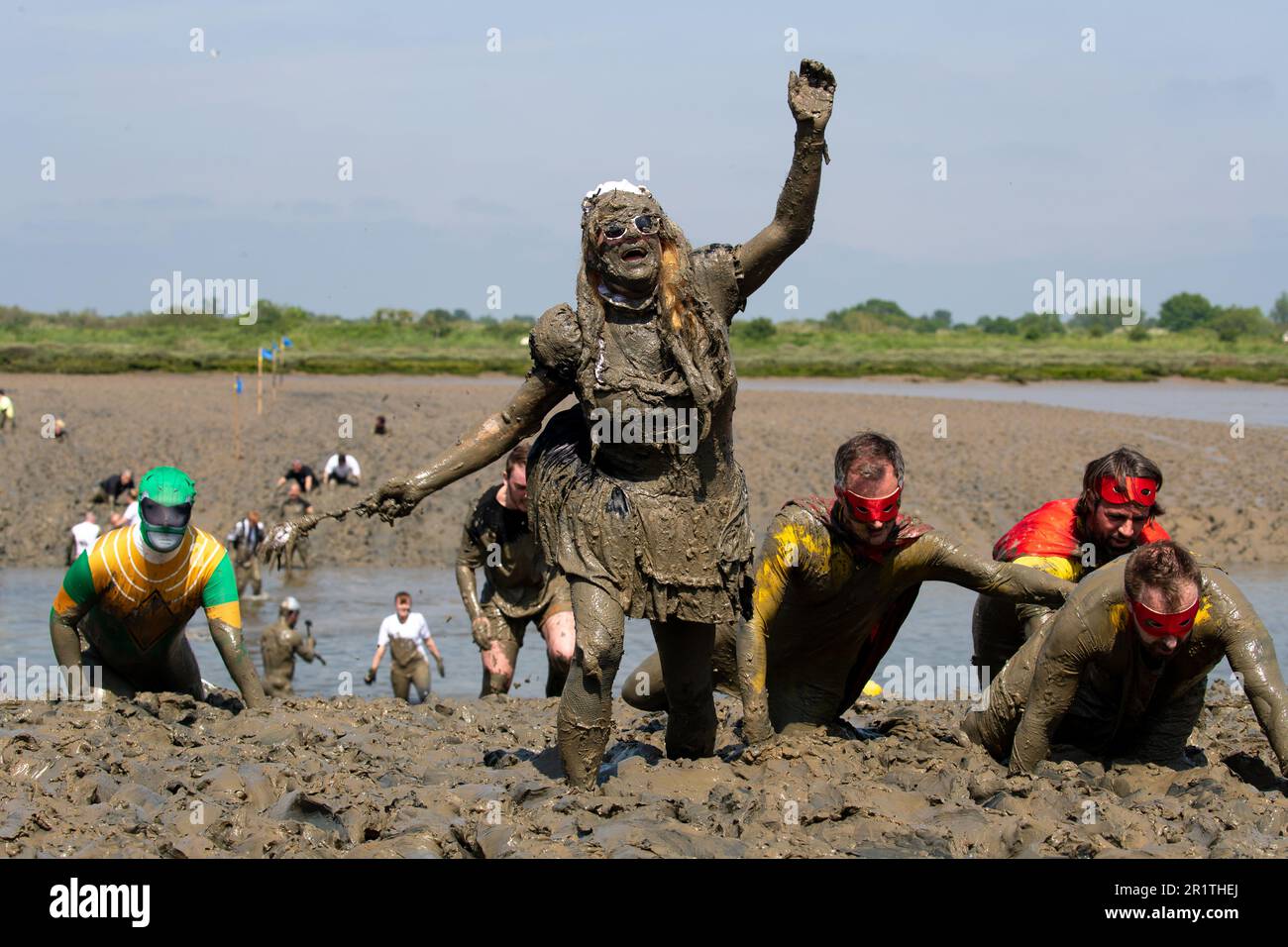 Maldon, UK. 14th May, 2023. Competitors take part in the Maldon Mud Race. The mud race consists ...