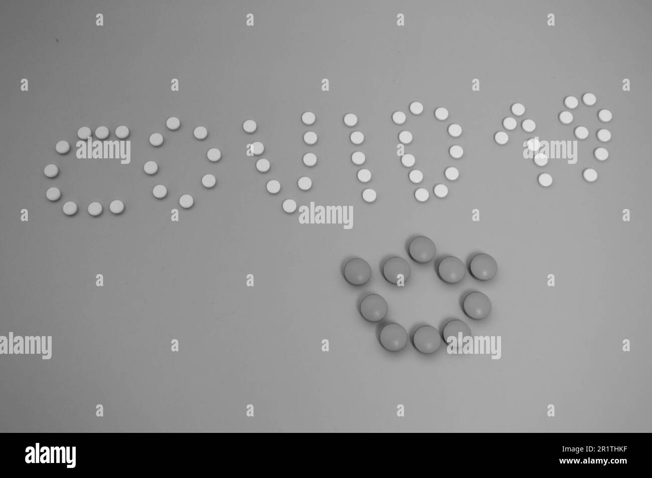 medical tablets laid out the inscription coronavirus 19 on a gray ...