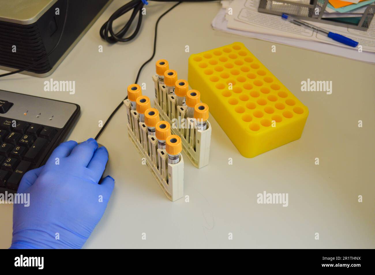 Medicine doctor working and using mouse on computer Stock Photo - Alamy