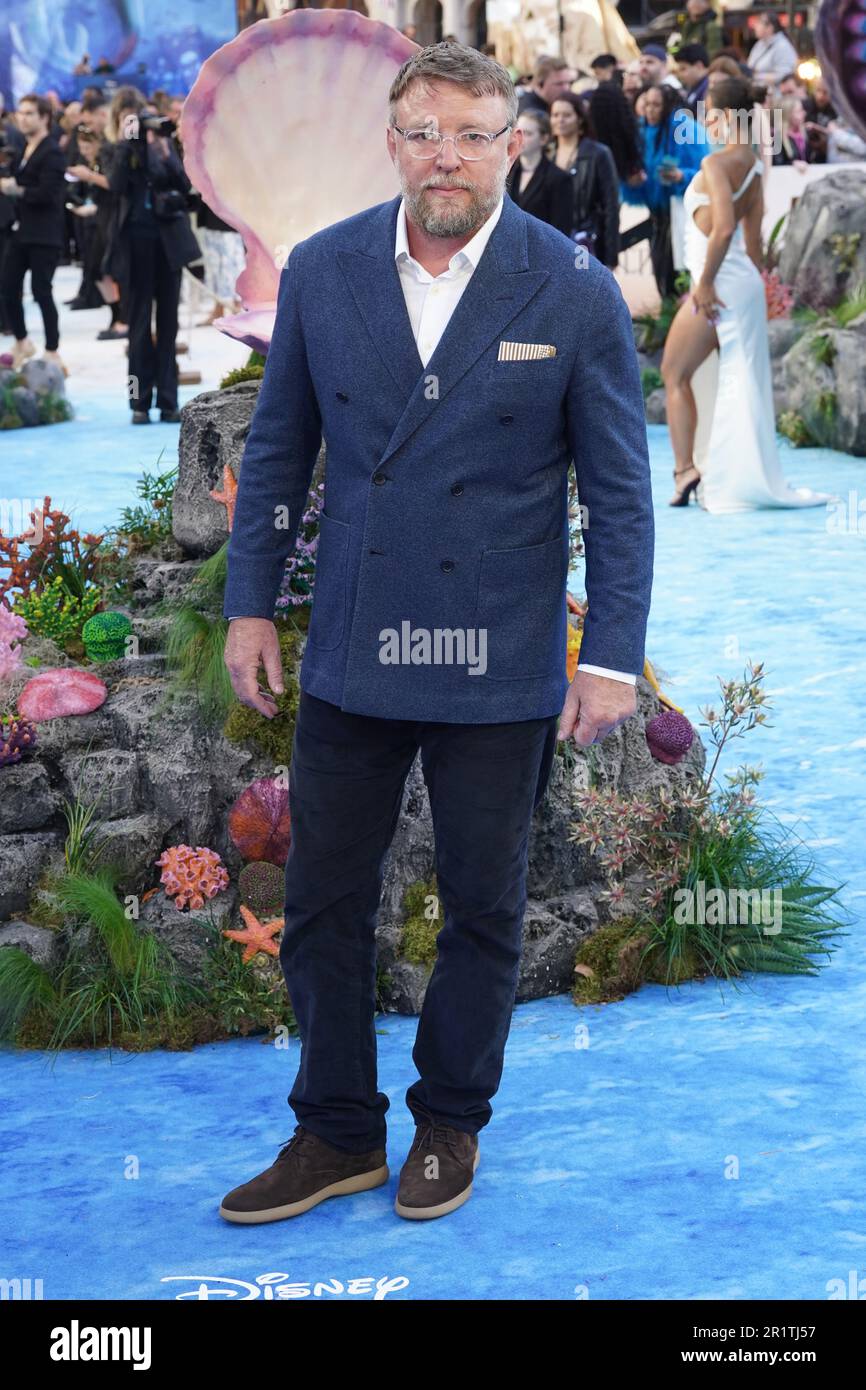 Guy Ritchie attending the UK Premiere of the live action re-imagining ...