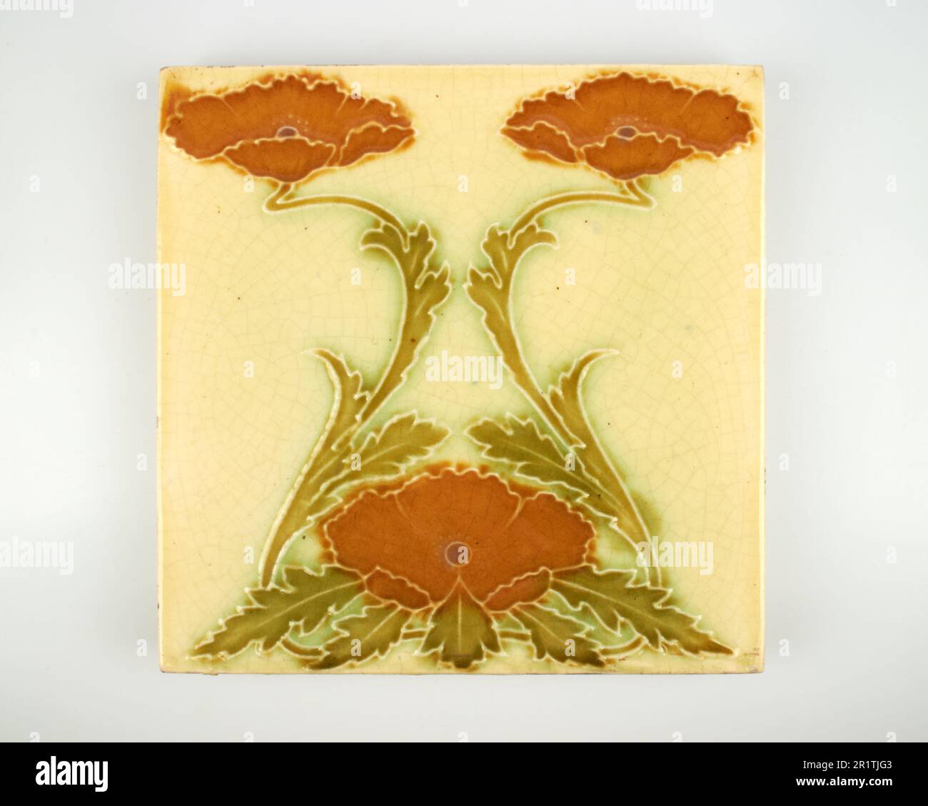 Antique 1900s English Art Nouveau amber poppy pottery tile Stock Photo ...
