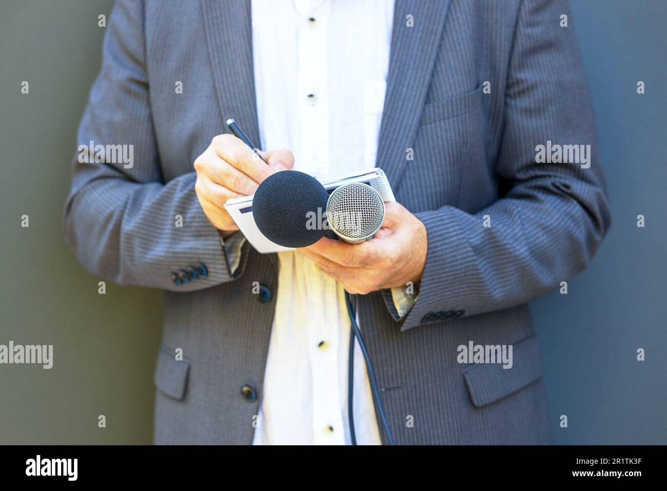TV journalist at news or media event Stock Photo - Alamy