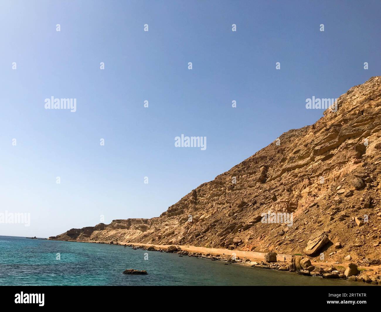 A large beautiful majestic stone sandy mountain, a mound, a hill, a ...