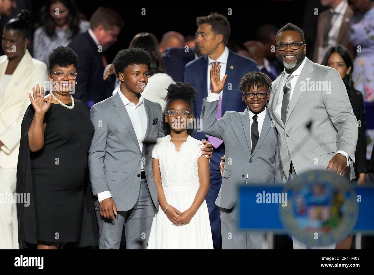 Chicago Mayor Brandon Johnson, right, stands with his family from left ...