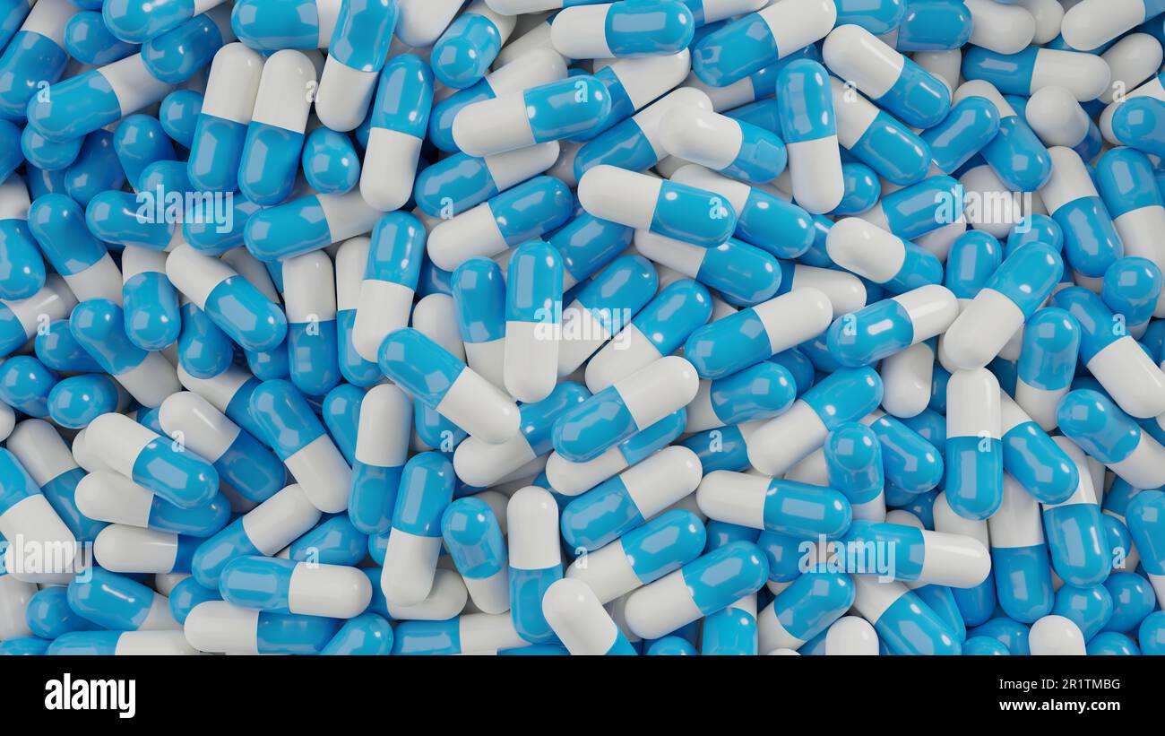 Bunch of blue white capsule pills on a white background - Medicine ...