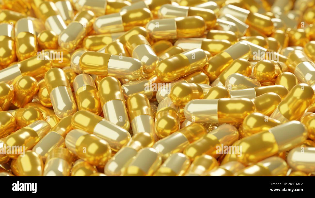 Bunch of golden shiny capsule pills on a orange background - Medicine ...
