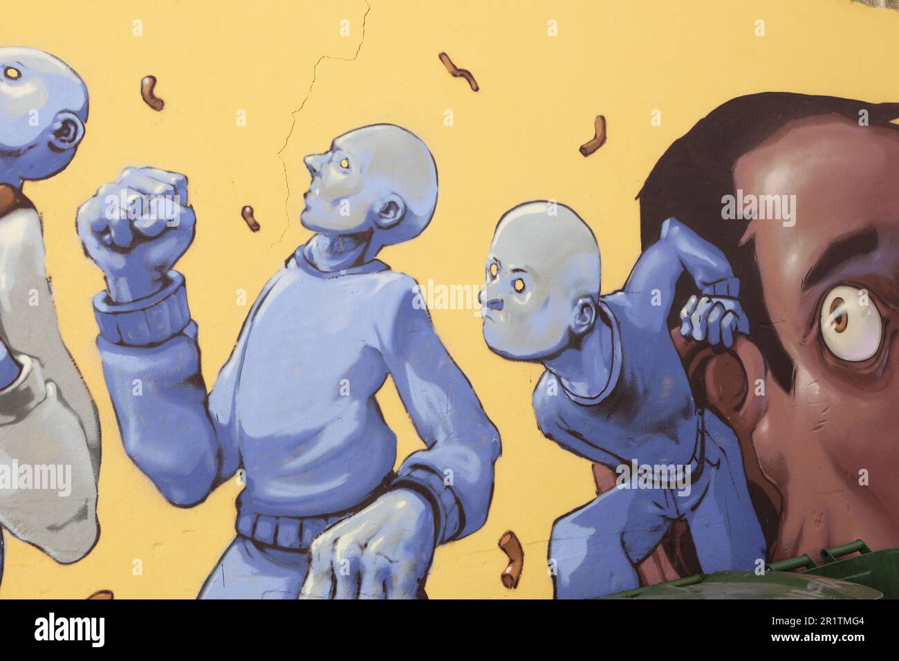 Street art graffiti of blue men playing musical instruments on a wall ...