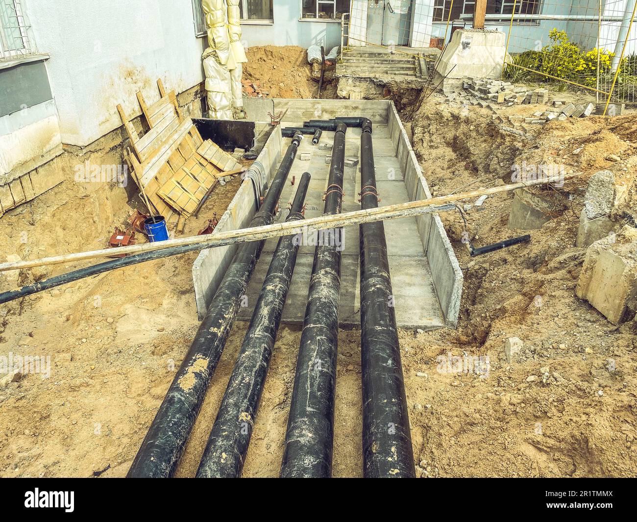 black, polypropylene, long pipes are laid underground for ...