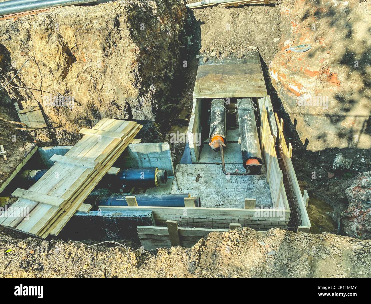 laying of underground communications for residential buildings. black ...