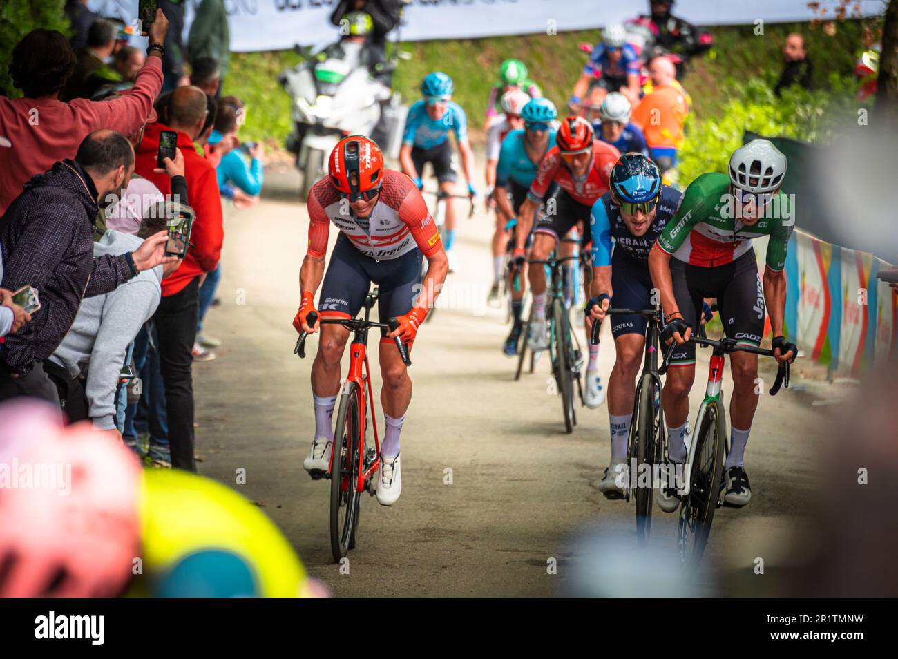 Italy, May 13, 2023: professional cyclists face the eighth stage of the ...