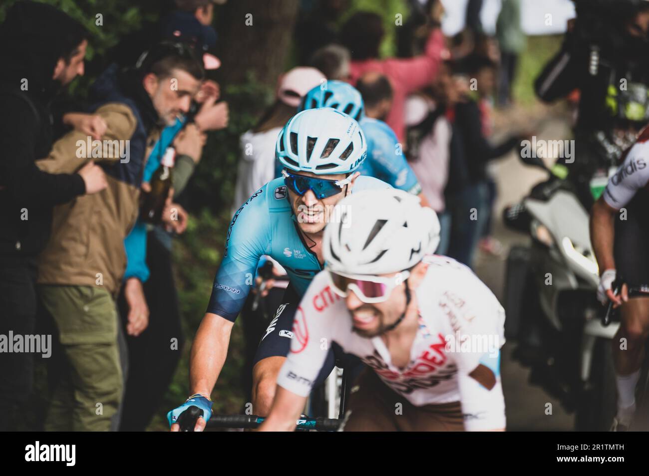 Italy, May 13, 2023: professional cyclists face the eighth stage of the ...