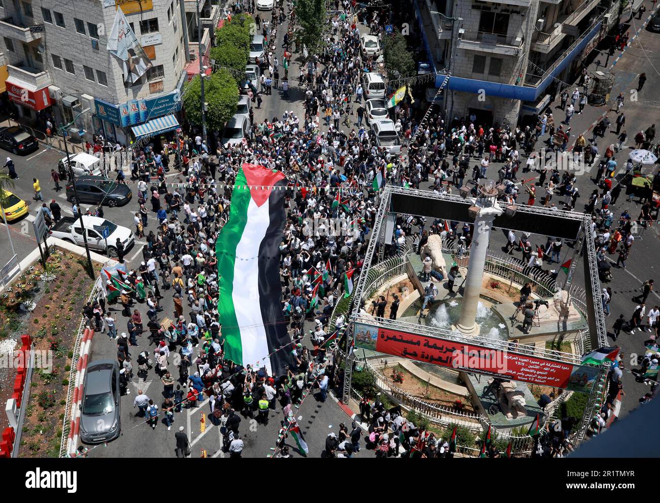Ramallah. 15th May, 2023. Palestinian people participate in a ...