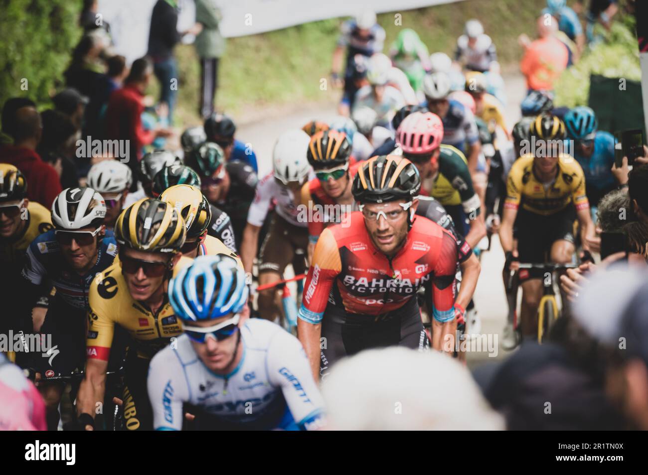 Italy, May 13, 2023: professional cyclists face the eighth stage of the ...