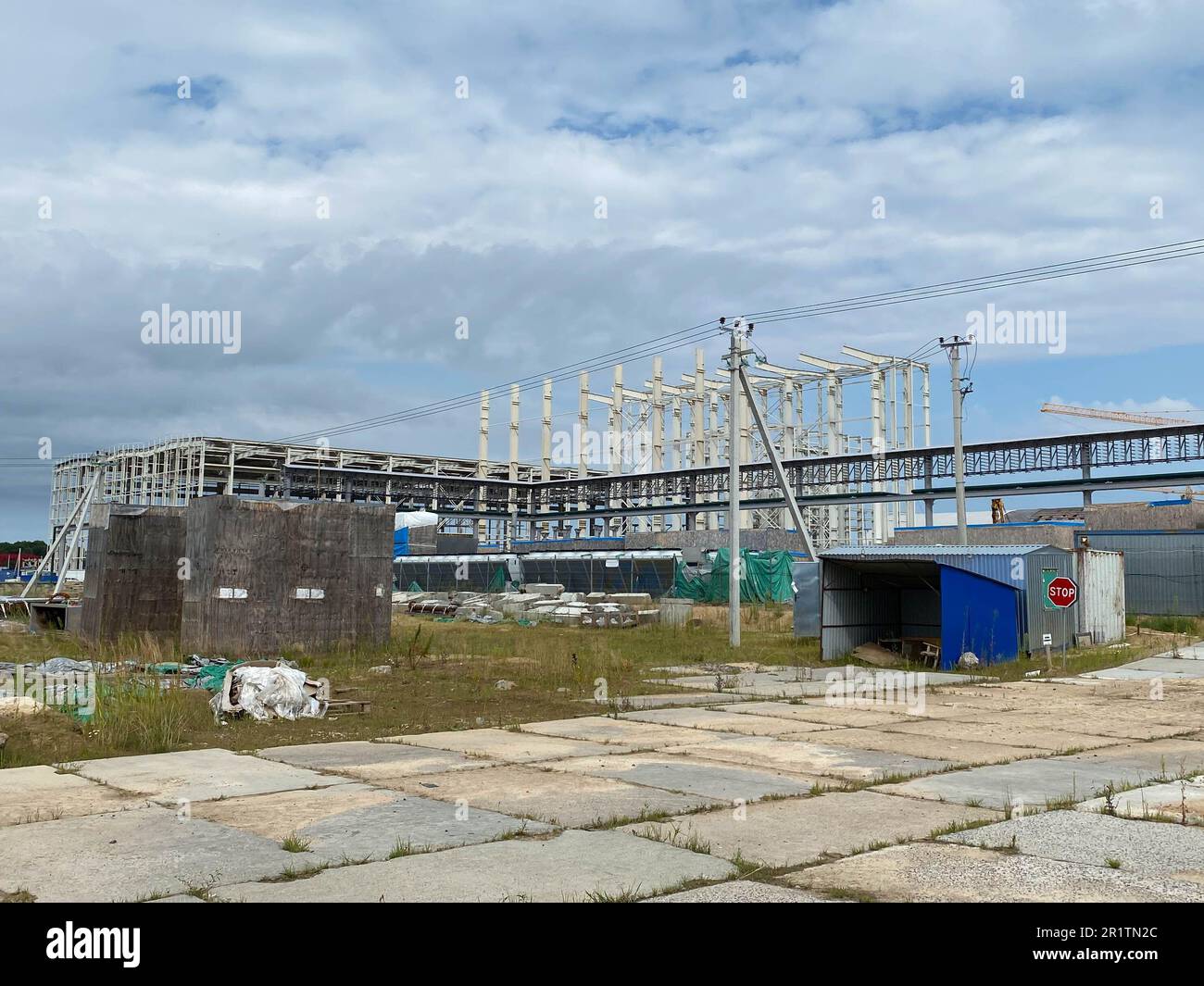 A large outdoor warehouse at a construction site, a warehouse for ...