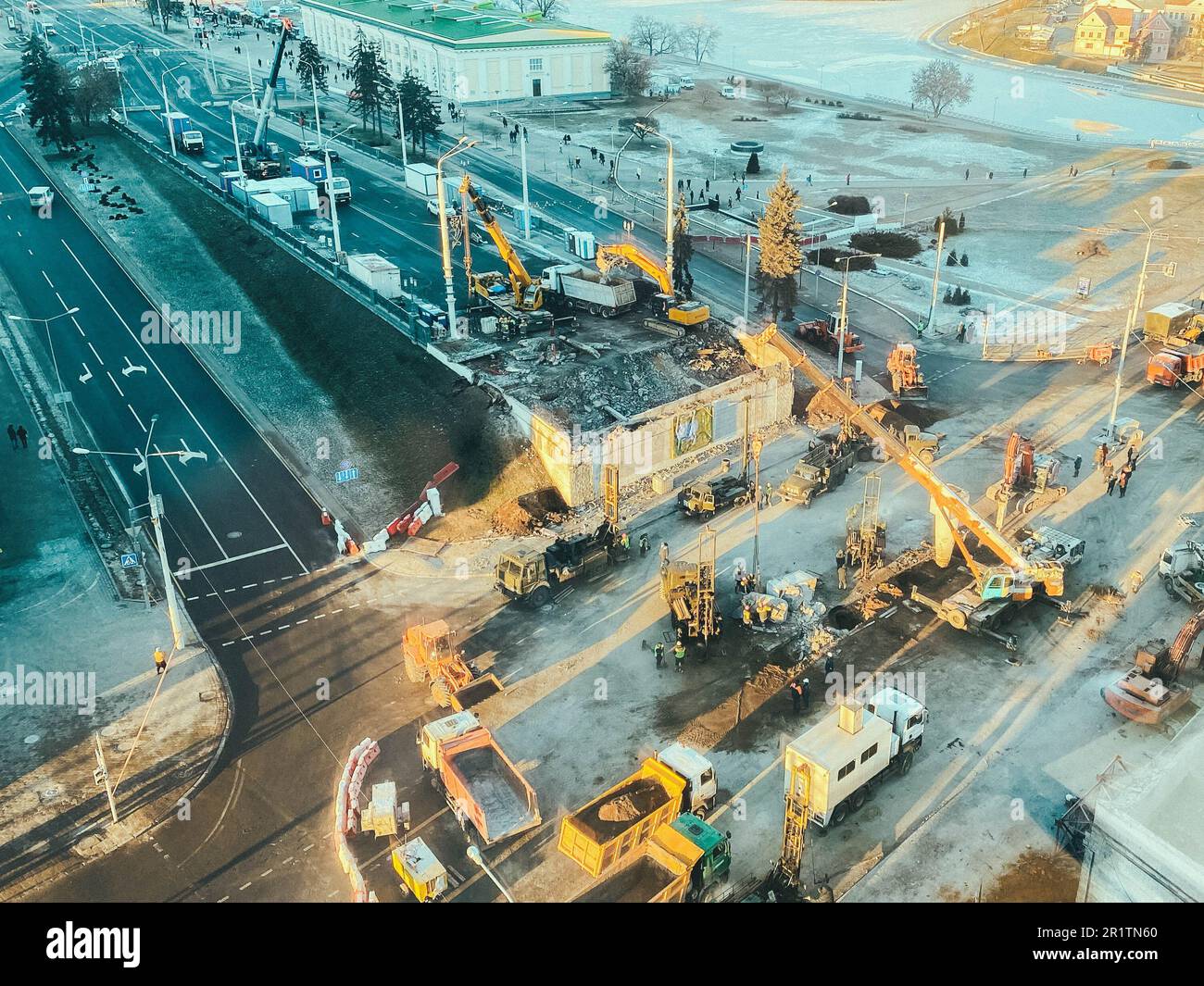 construction of a new overpass in the city center on a snowy street ...