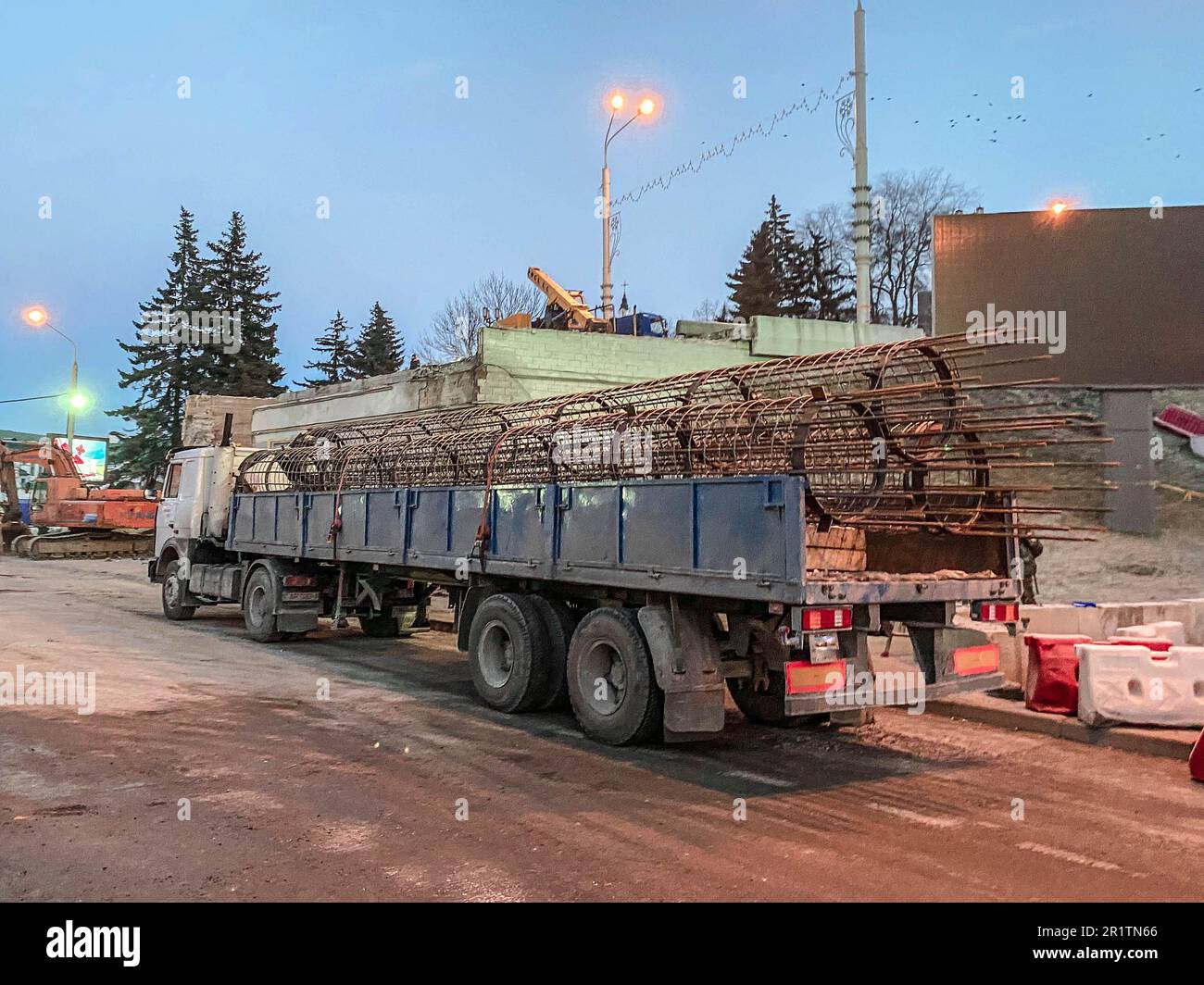 construction of a broken bridge on a busy road. a heavy truck brought ...