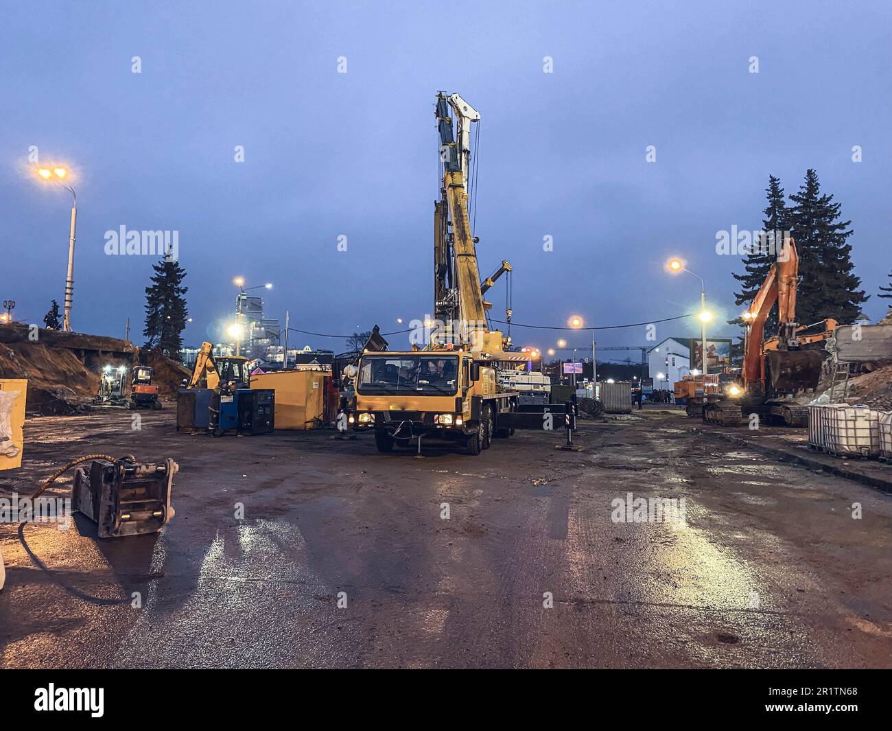 construction of a bridge in the city center. construction equipment is ...