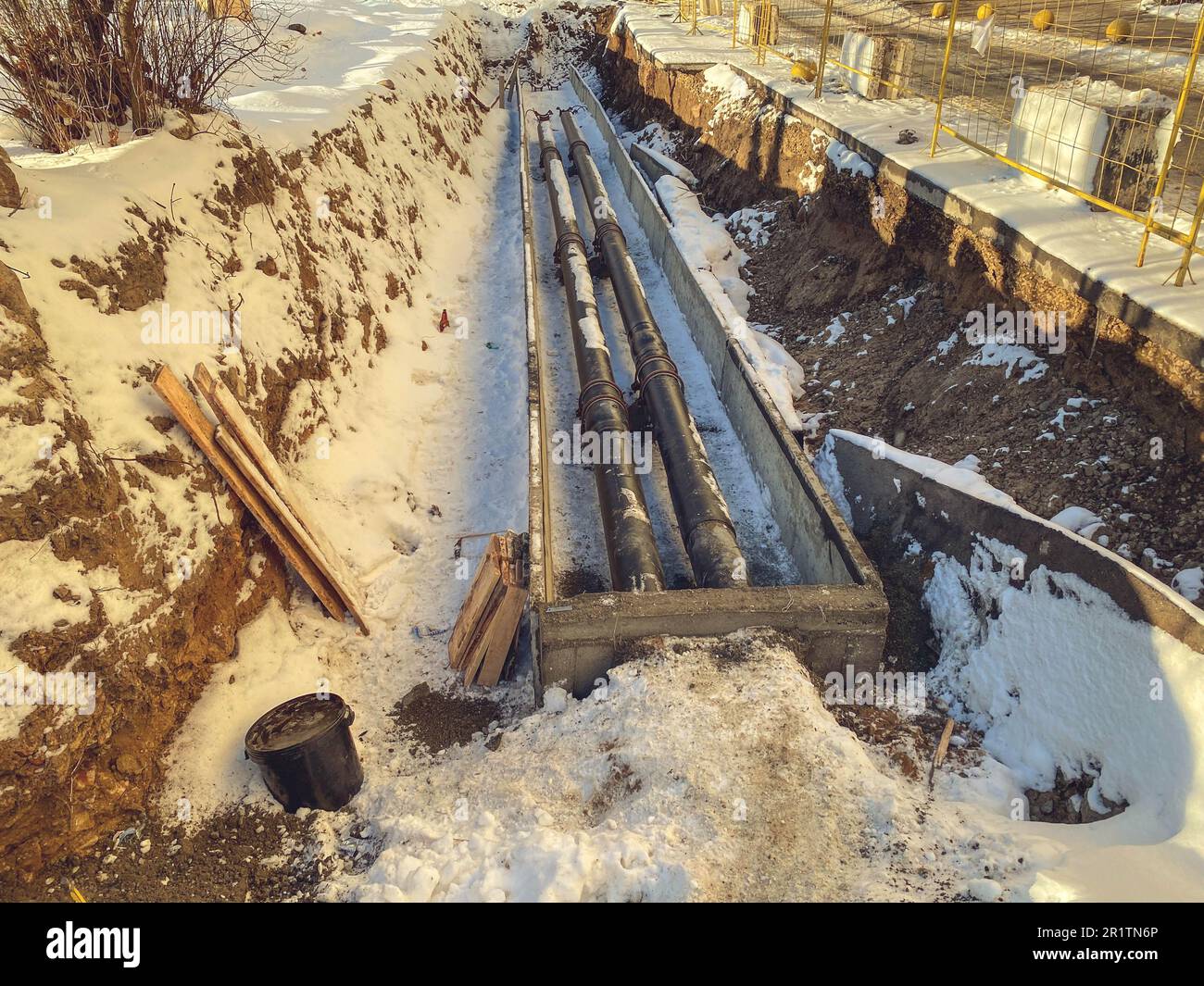 small, black, narrow pipes for laying plumbing communications. metal ...