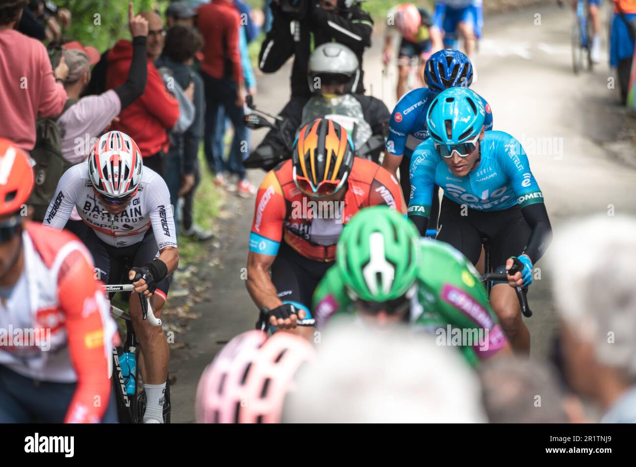 Italy, May 13, 2023: professional cyclists face the eighth stage of the ...