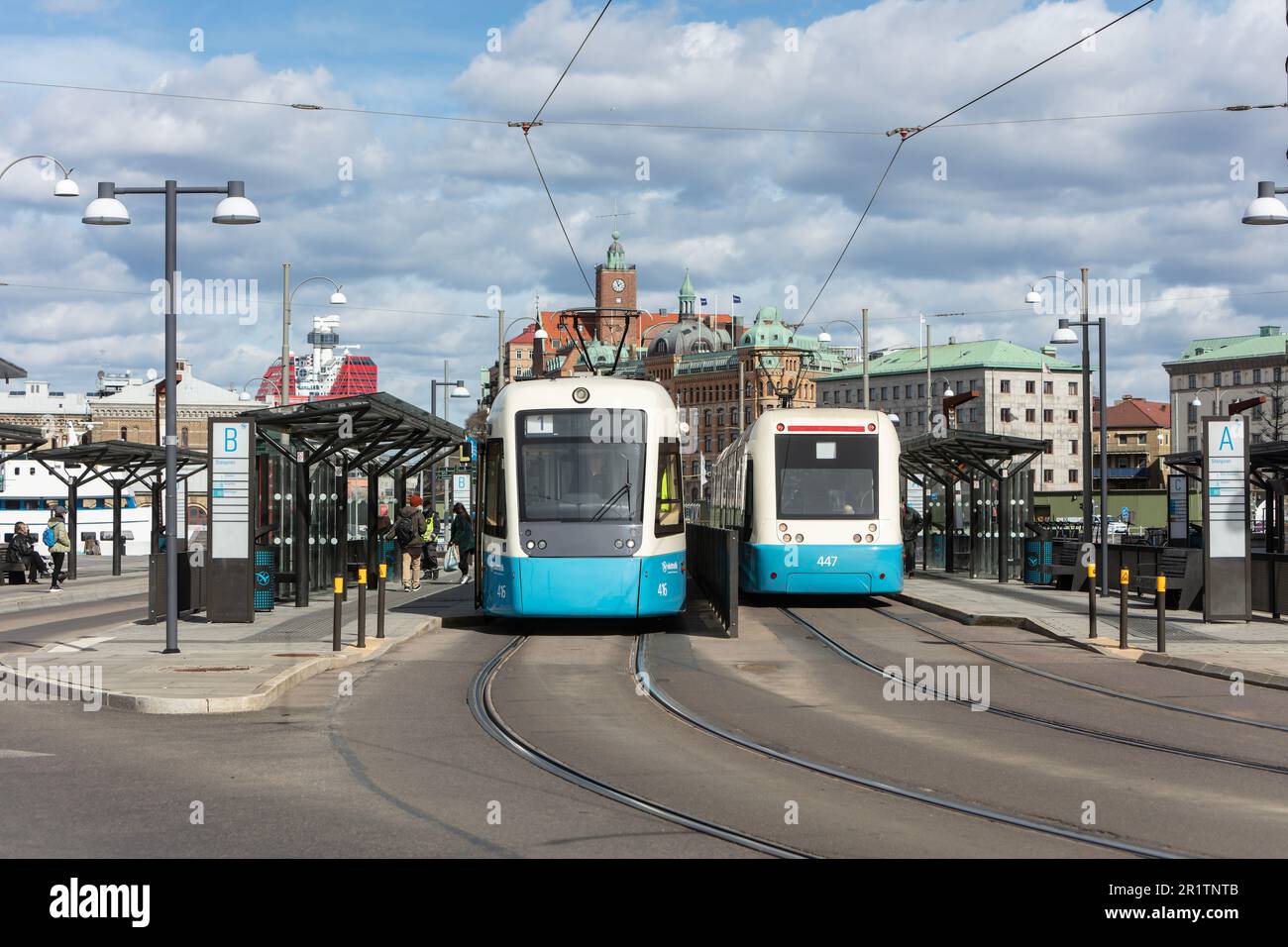 Trams at Stenpiren bus, ferry, tram terminal at Skeppsbron by Gota ...