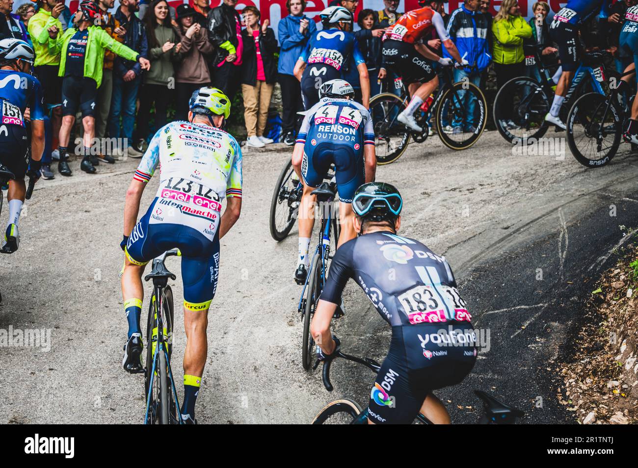 Italy, May 13, 2023: professional cyclists face the eighth stage of the ...