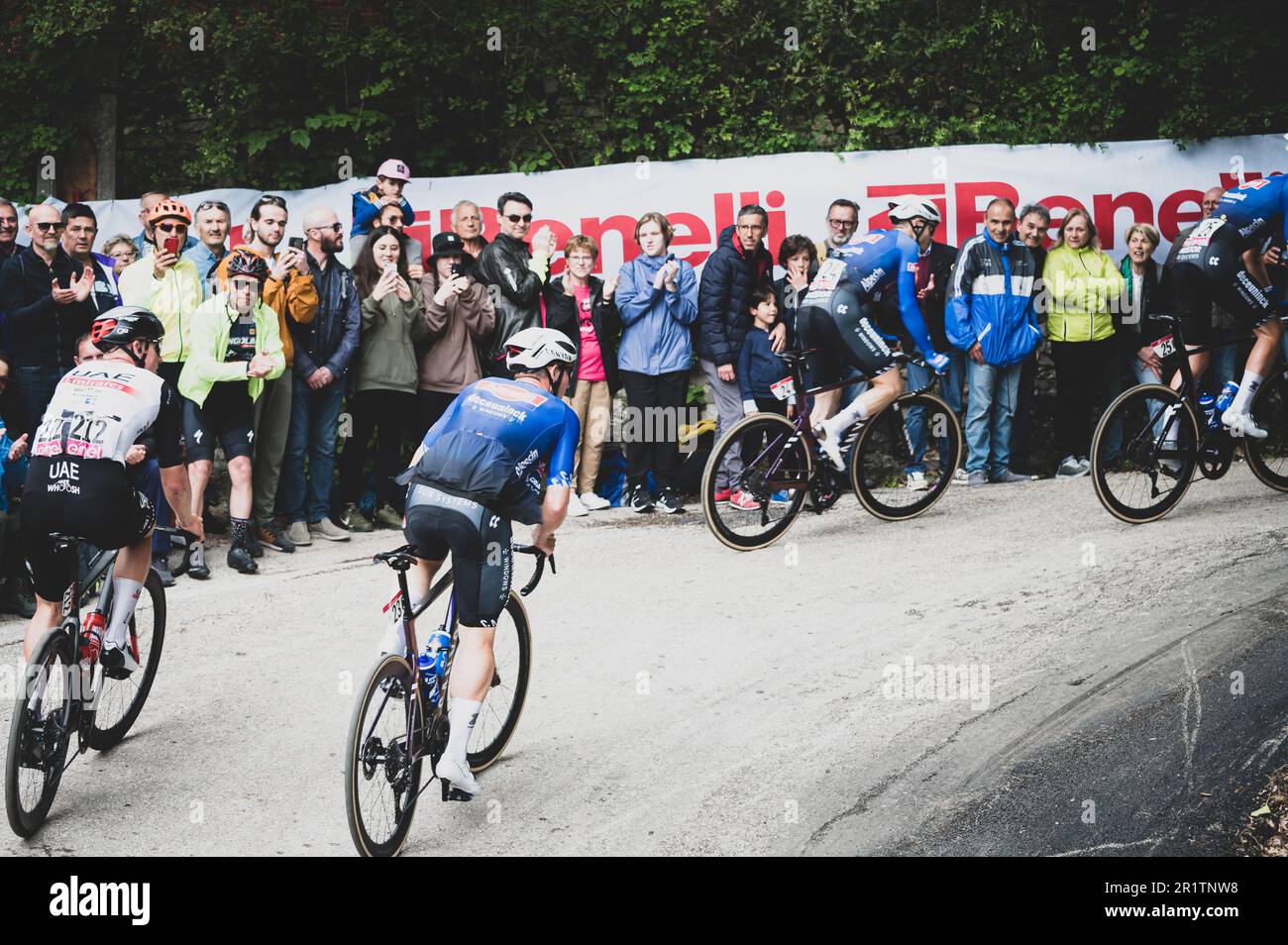 Italy, May 13, 2023: professional cyclists face the eighth stage of the ...