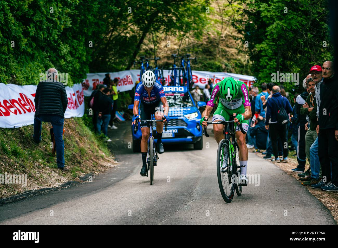 Italy, May 13, 2023: professional cyclists face the eighth stage of the ...