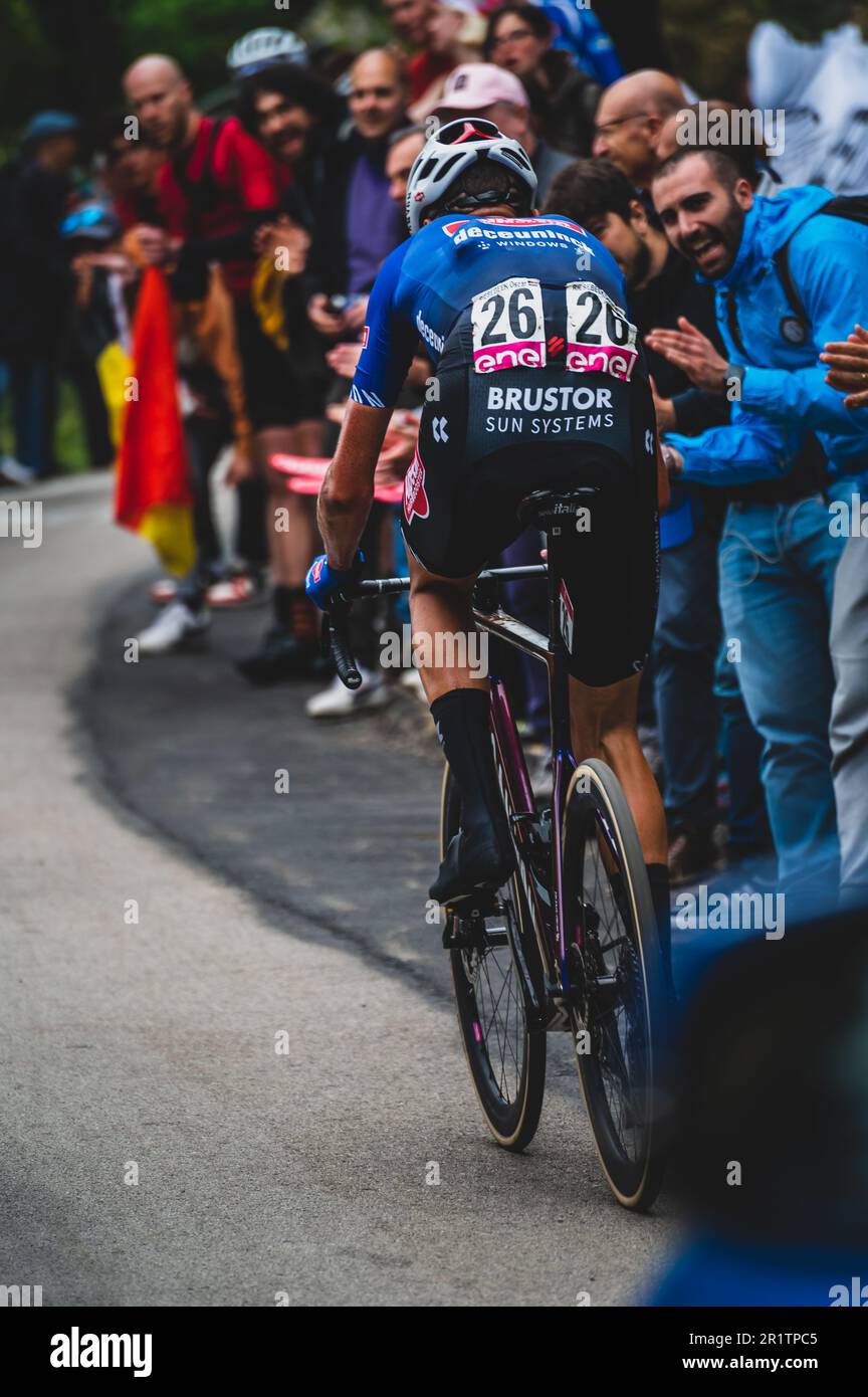 Italy, May 13, 2023: professional cyclists face the eighth stage of the ...