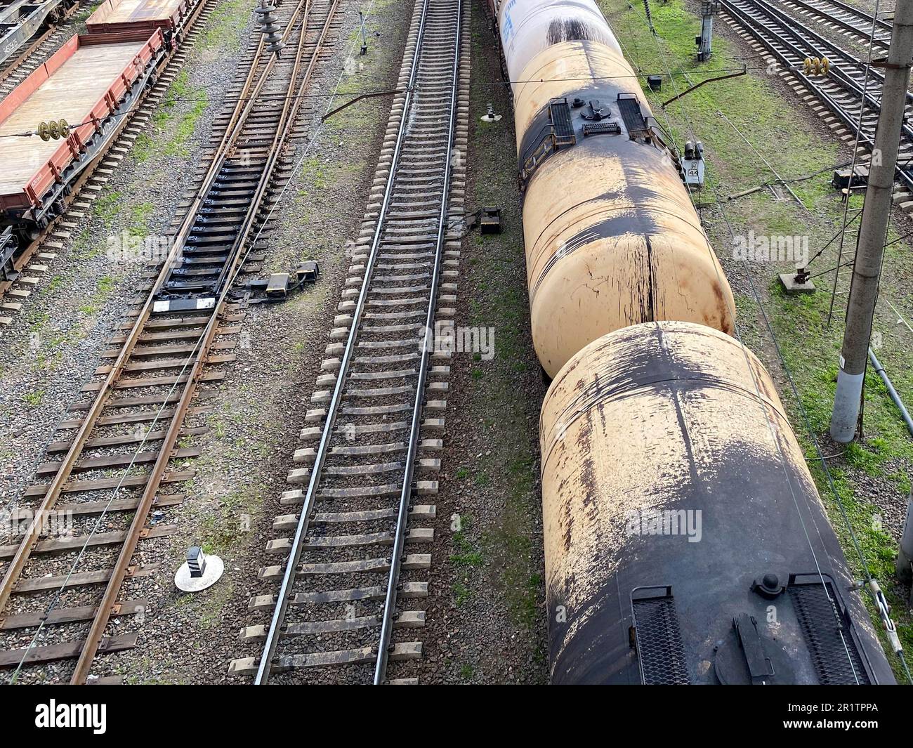 Top view of different railway wagons and tanks on an industrial ...