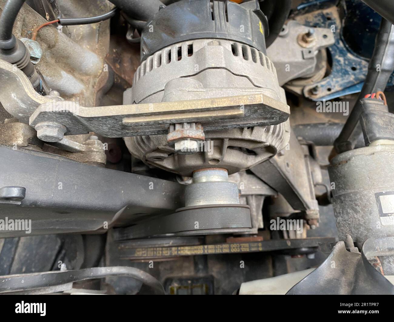 Front engine compartment of an old Japanese car with clean components ...