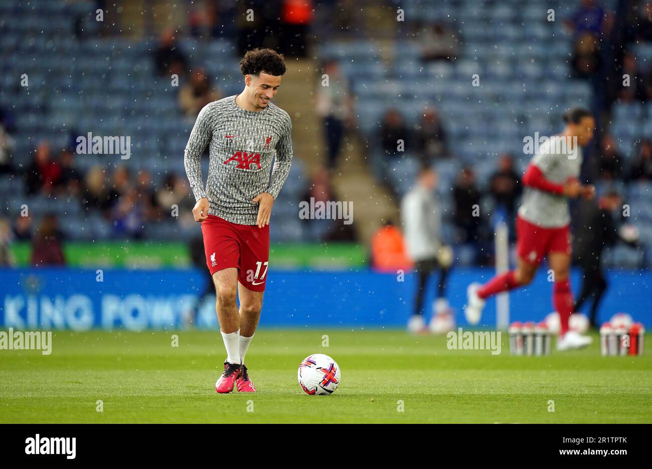 Liverpool's Curtis Jones warms up on the pitch before the Premier ...