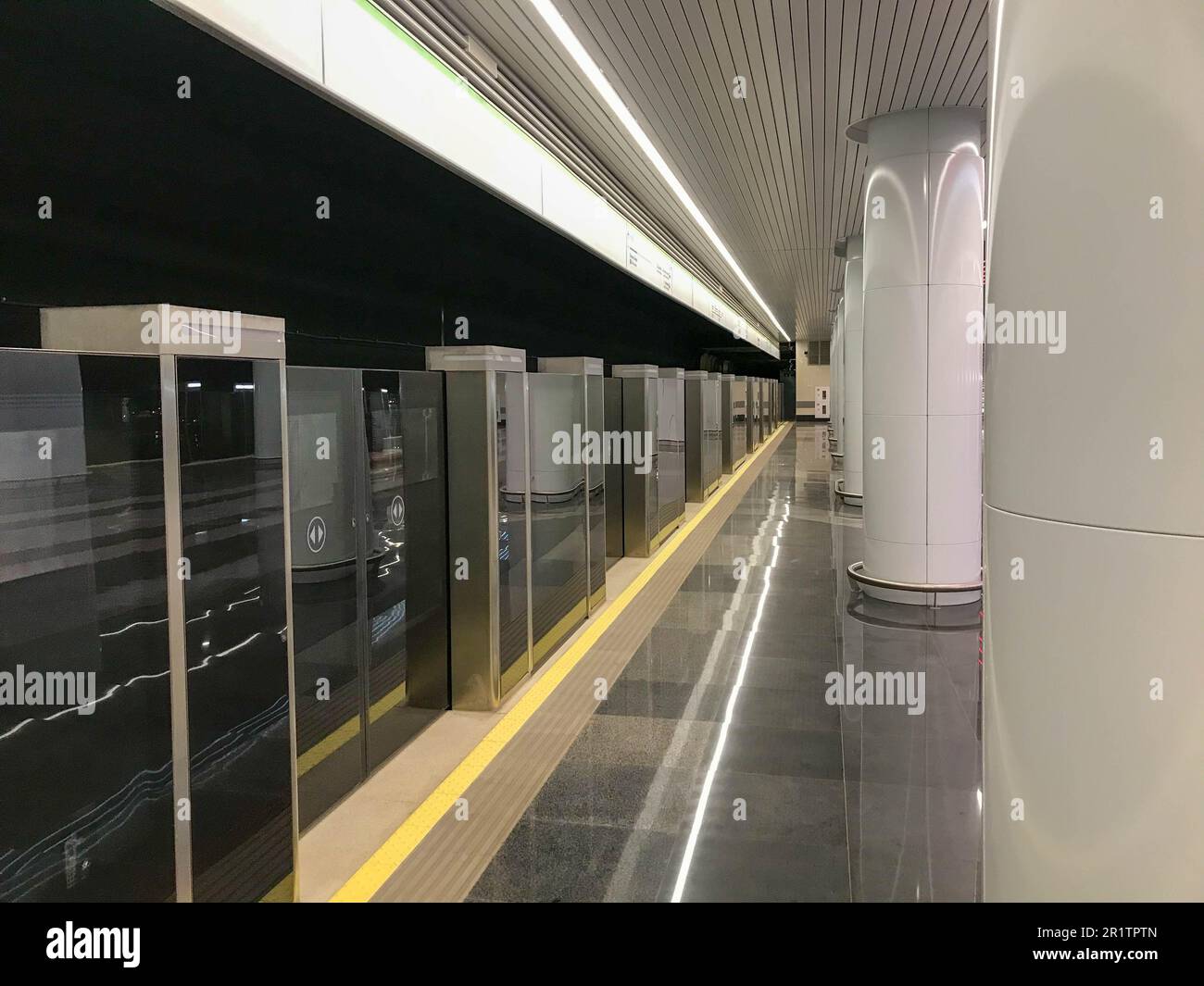 New beautiful modern underground train subway station with security ...