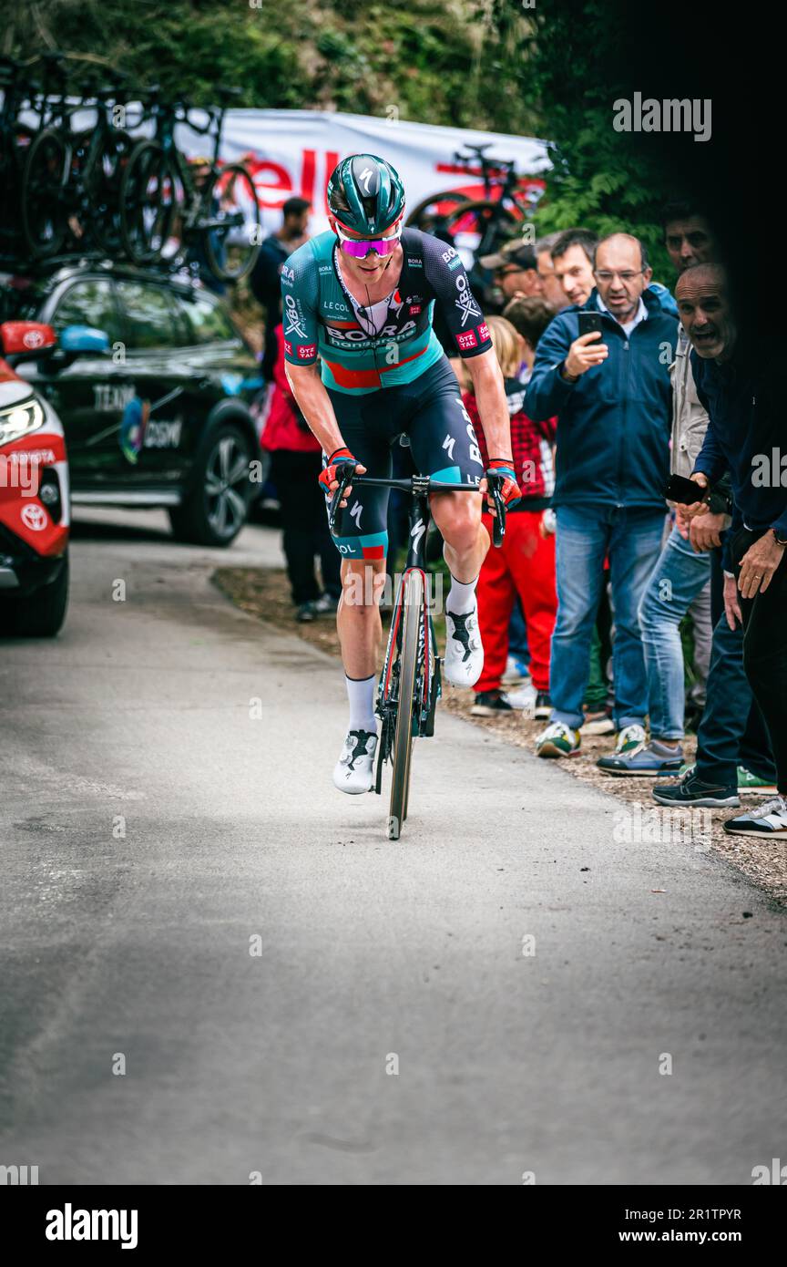 Italy, May 13, 2023: professional cyclists face the eighth stage of the ...