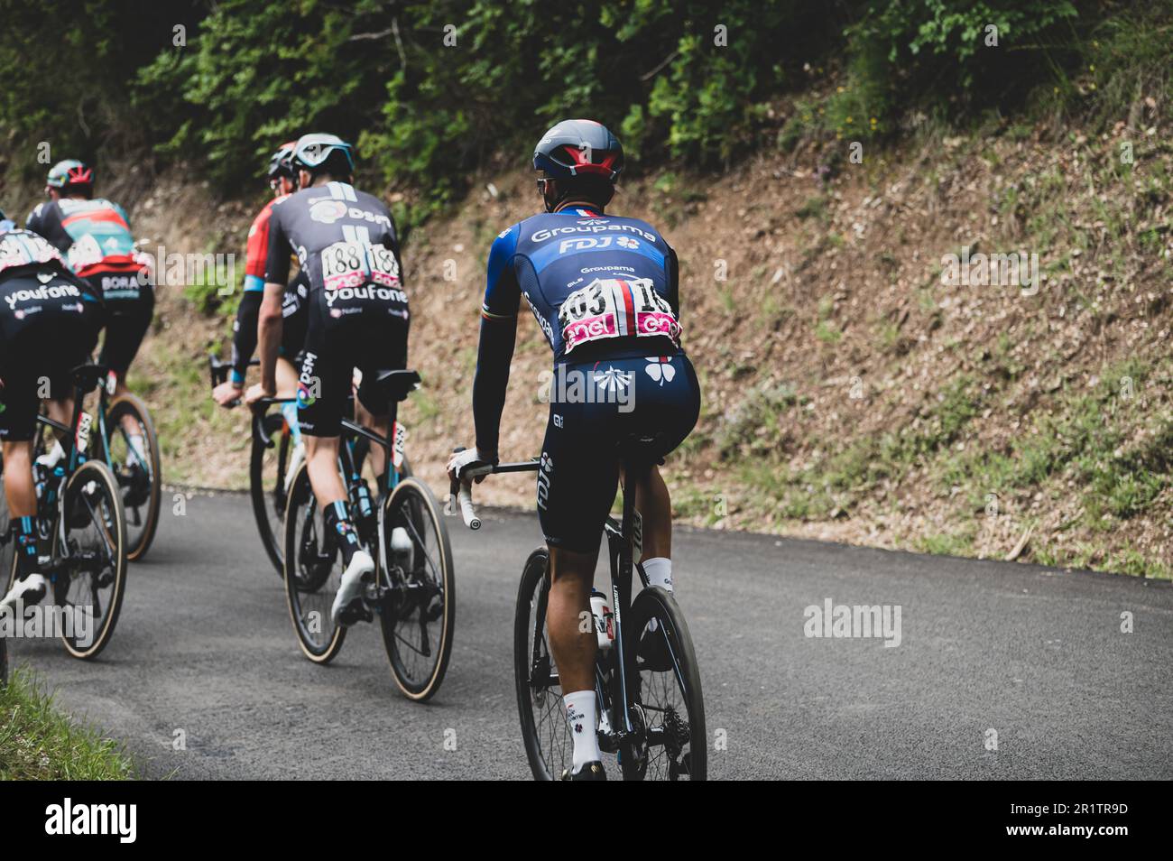 Italy, May 13, 2023: professional cyclists face the eighth stage of the ...