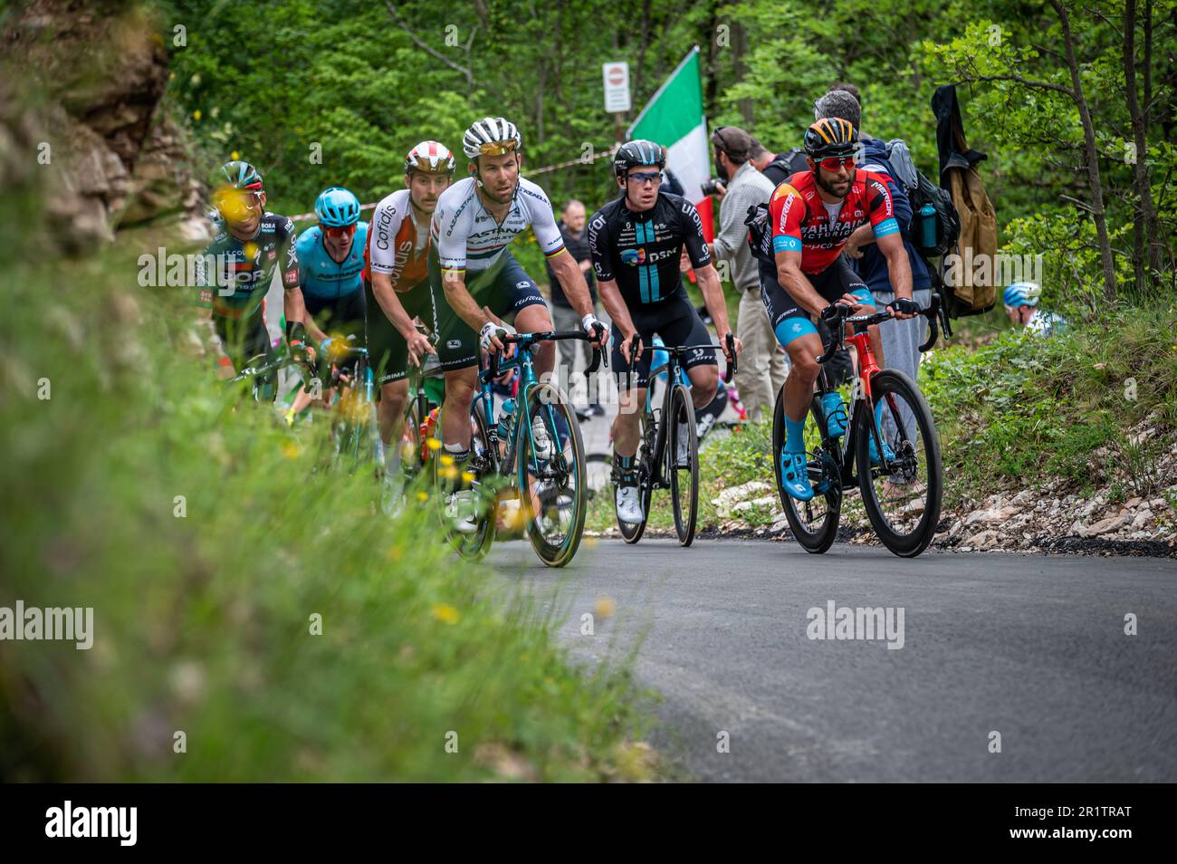 Italy, May 13, 2023: professional cyclists face the eighth stage of the ...