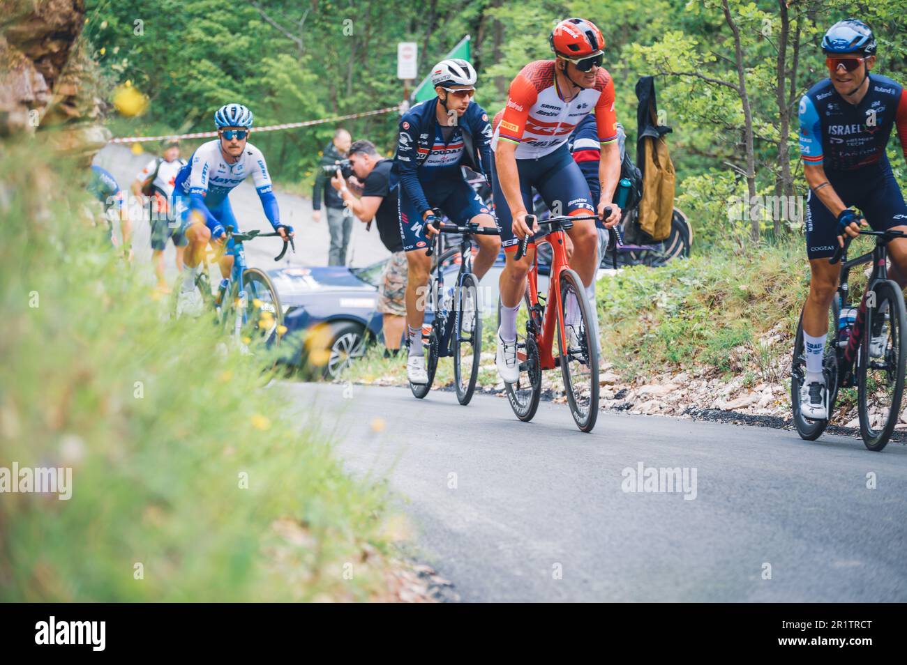 Italy, May 13, 2023: professional cyclists face the eighth stage of the ...