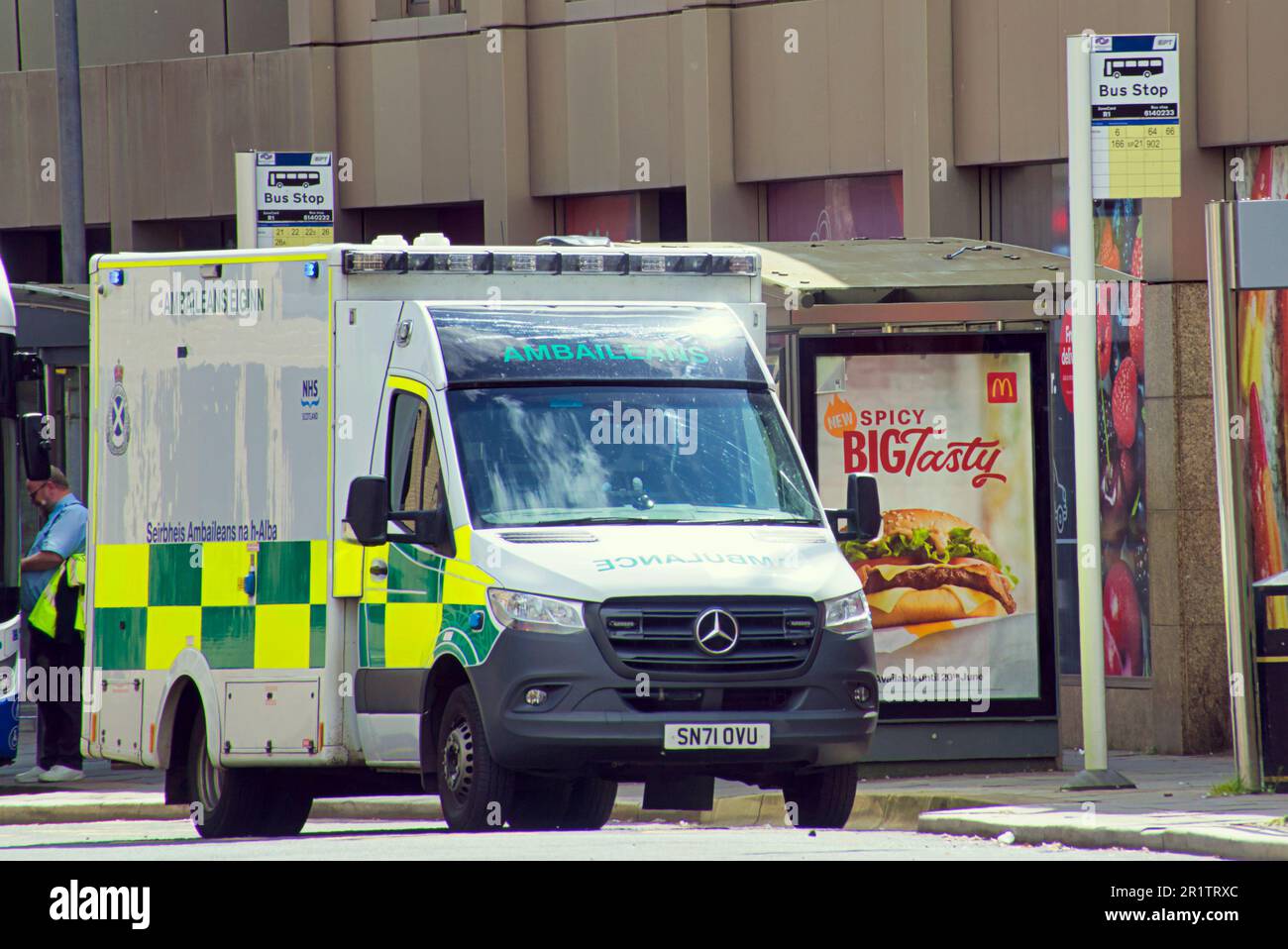 ambulance at a bus stop Stock Photo - Alamy