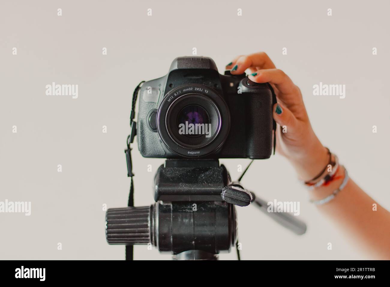 clicking record on a camera Stock Photo - Alamy