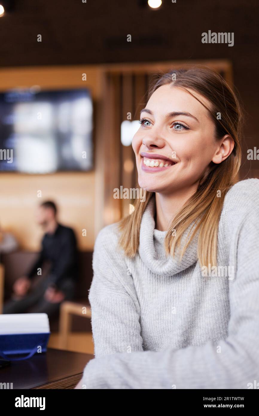 Cute girl sitting cafe hi-res stock photography and images - Alamy