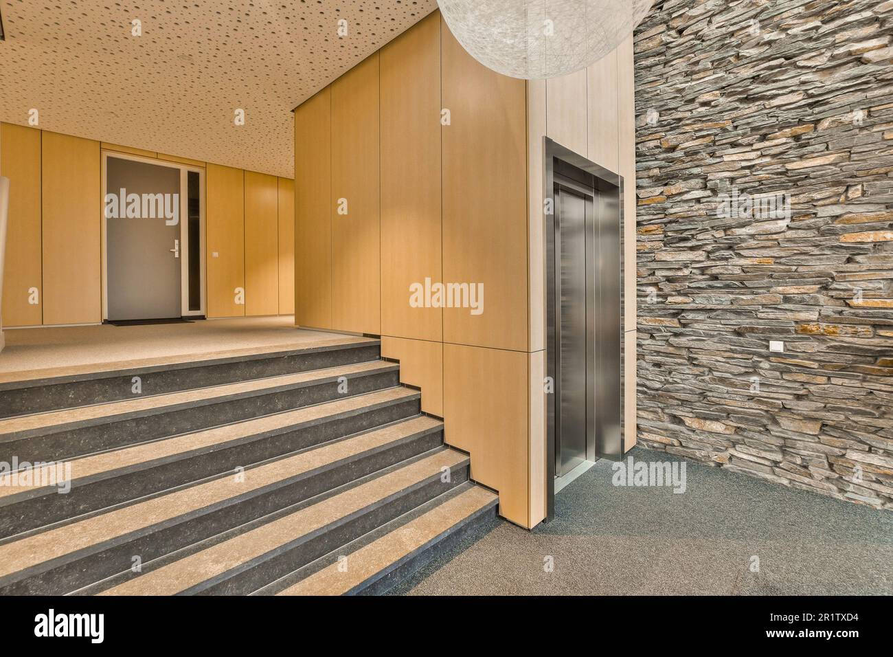 some stairs in a building with stone walls and wood panels on the wall ...
