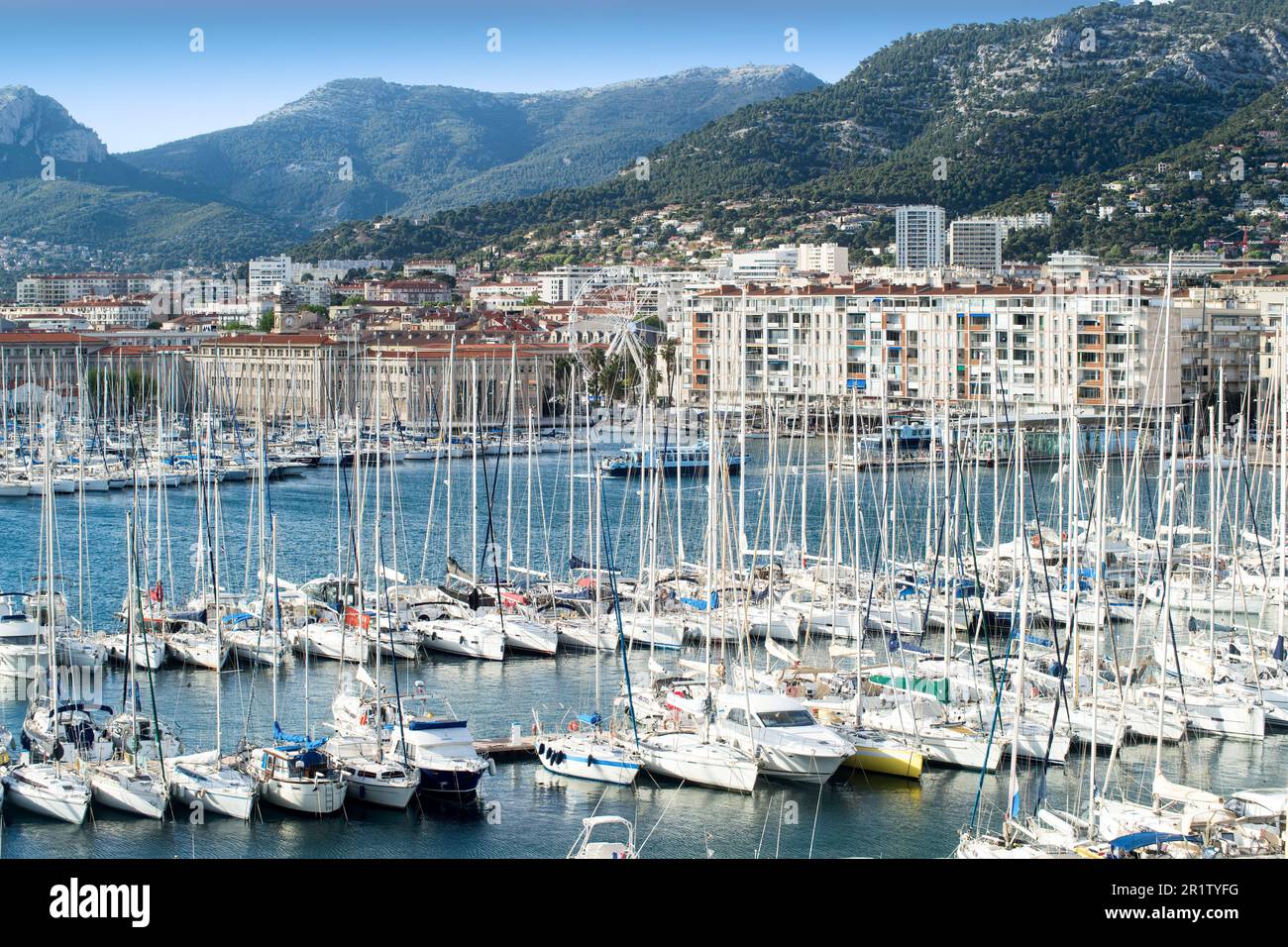 Sailboats in Toulon Harbor, late afternoon in spring Stock Photo - Alamy
