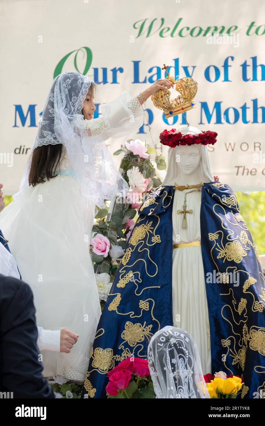 An 8 year old Hispanic girl from Corona performs the Roman Catholic ...