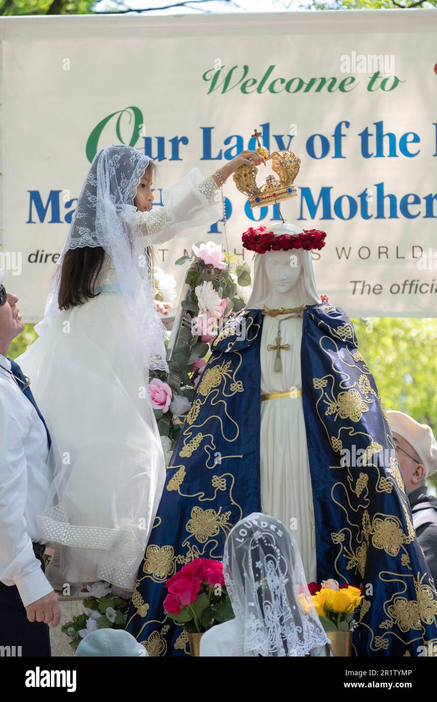 An 8 year old Hispanic girl from Corona performs the Roman Catholic ...