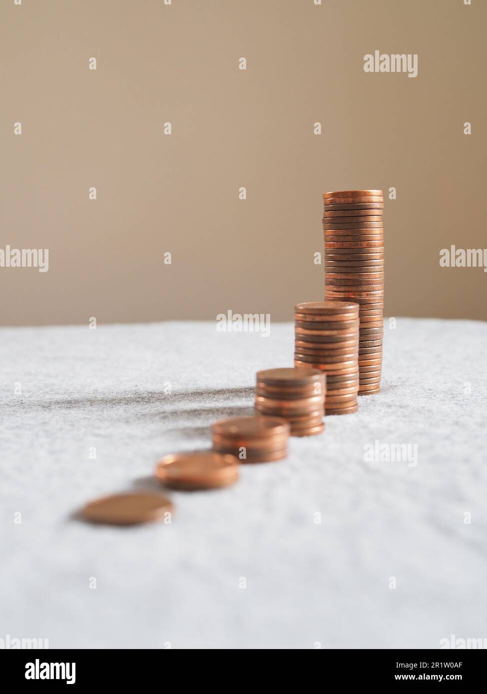 increasing stack of one euro cents that show exponential growth ...