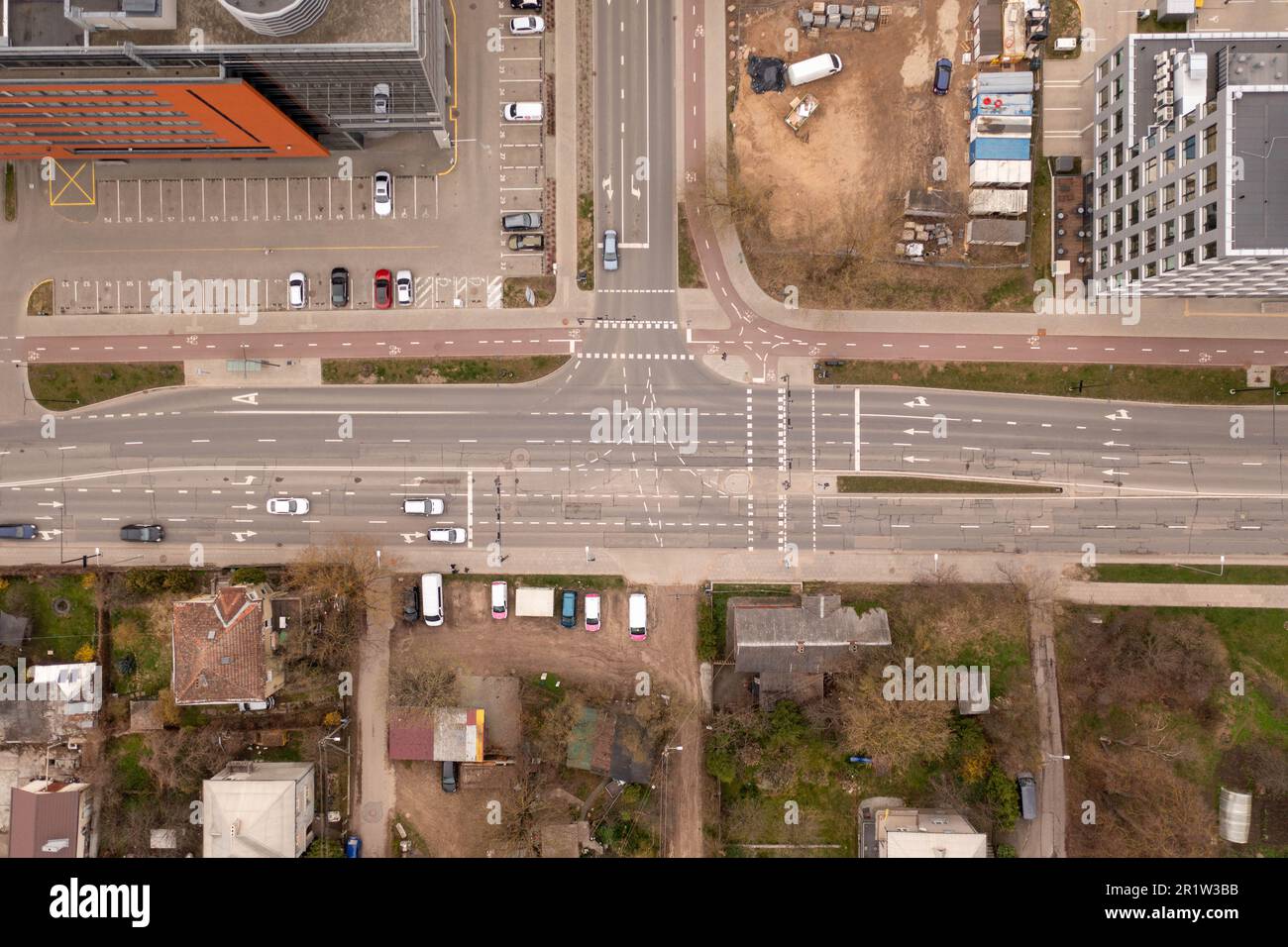 Drone photography of intersection in a city during spring day. Directly ...