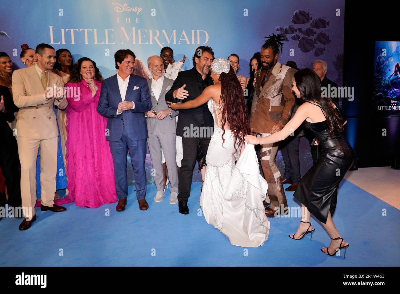 Halle Bailey and Javier Bardem hug as they attend the premiere of The ...