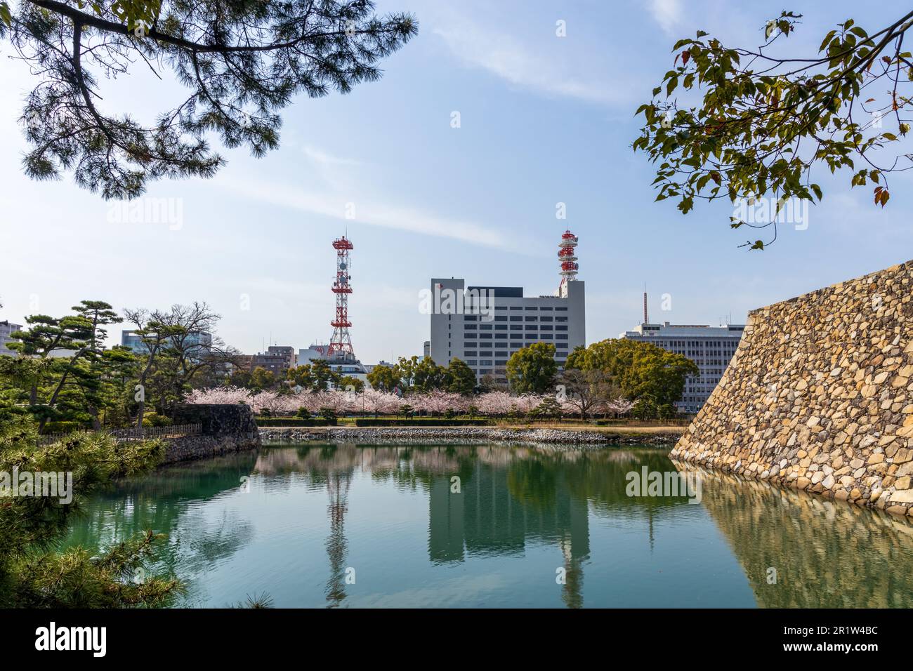 Communication Tower and cityscape viewed from Tamamo Park, or Takamatsu Castle Park in Takamatsu ...