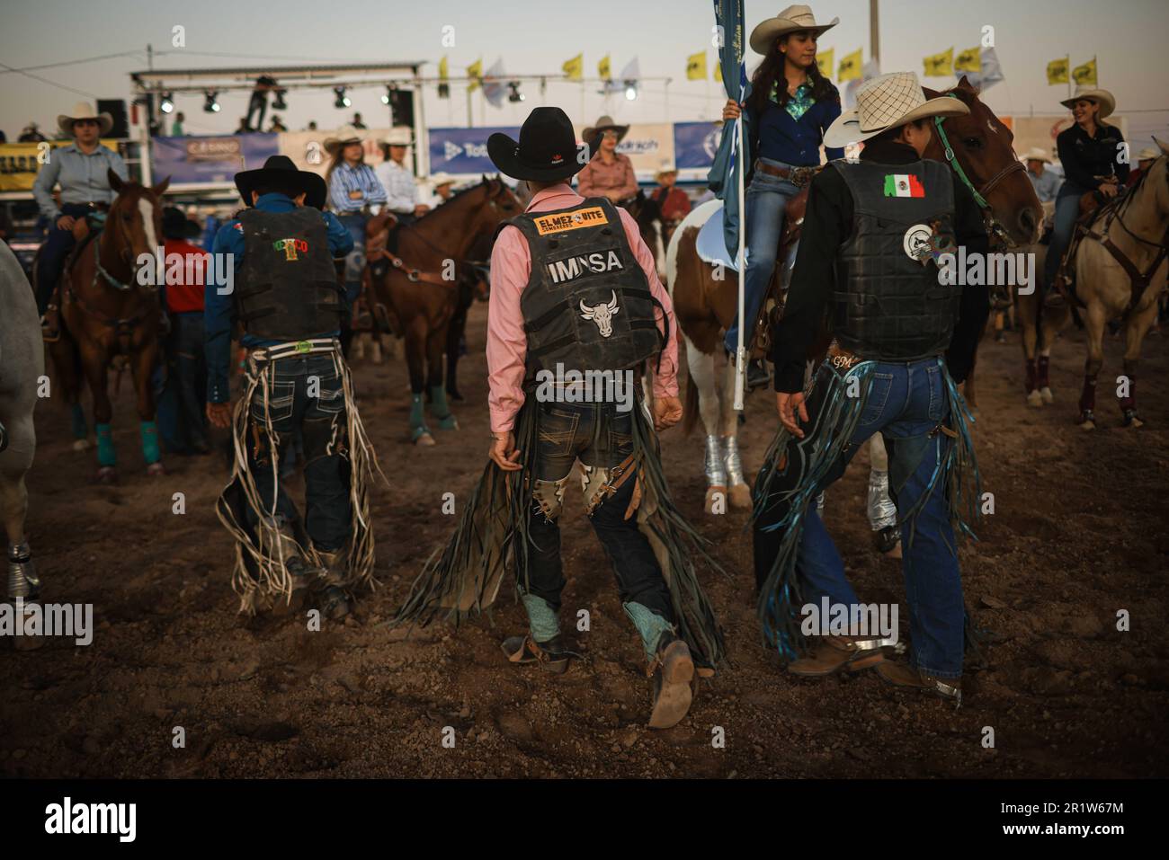 Cowboys, during the rodeo circuit at the Expo Ganadera de Sonora, on ...